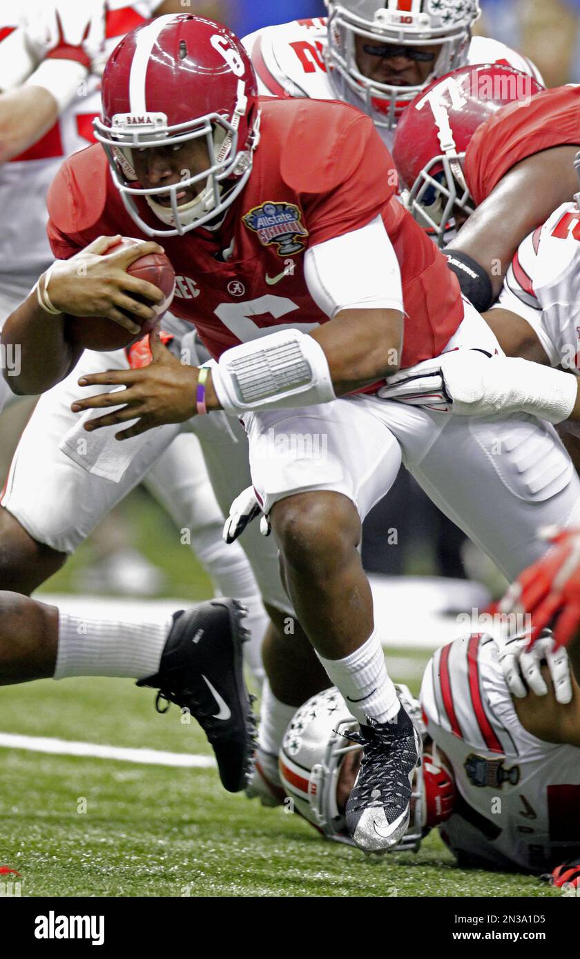 Alabama quarterback Blake Sims (6) heads toward the end zone for ...