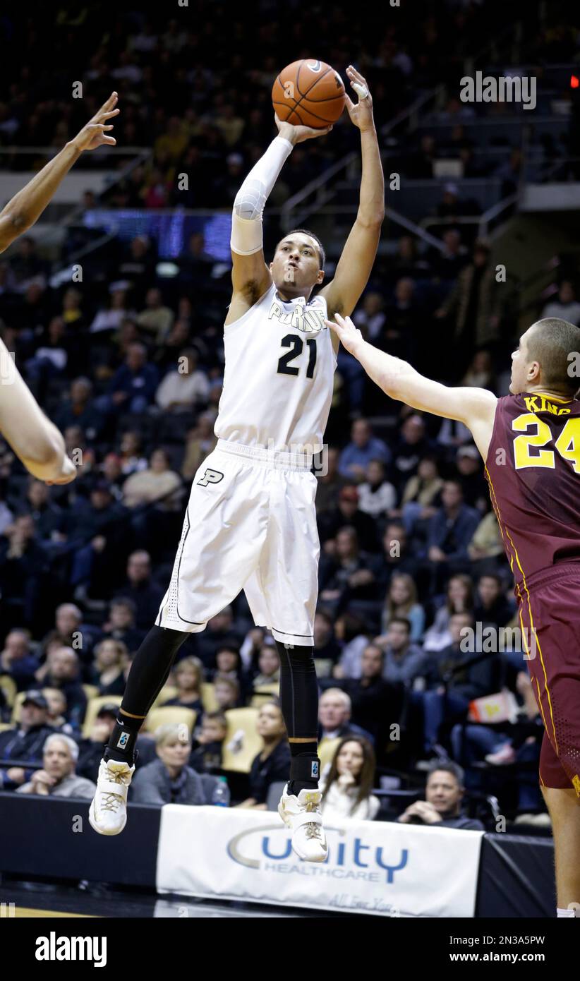Purdue guard Kendall Stephens (21) shoots over Minnesota forward Joey ...