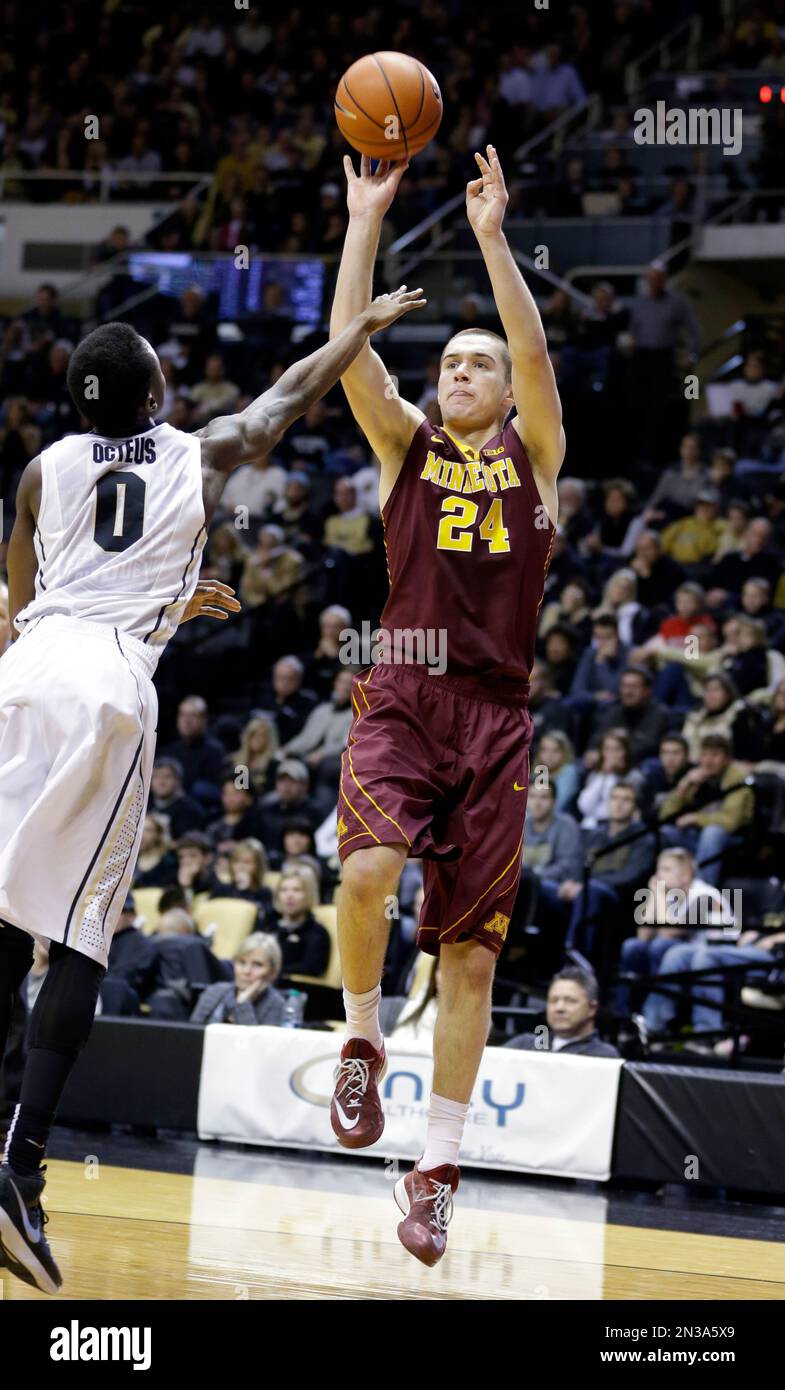 Minnesota forward Joey King (24) shoots over Purdue guard Jon Octeus (0 ...