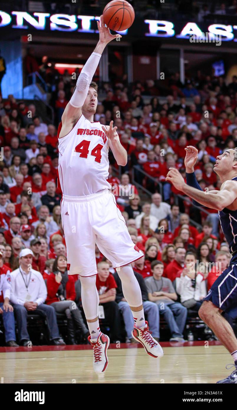 Wisconsin's Frank Kaminsky (44) shoots against Penn State's Ross Travis ...
