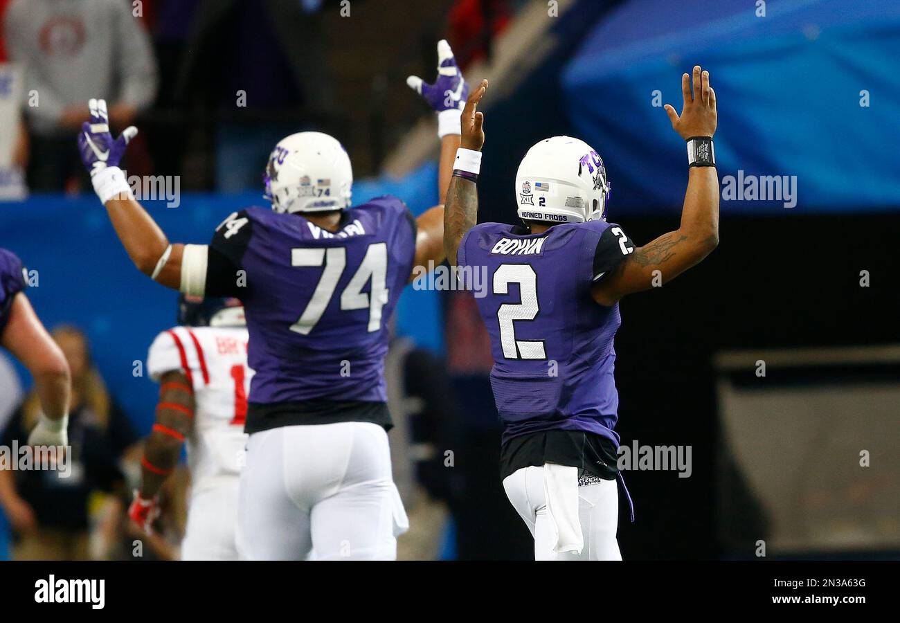 TCU quarterback Trevone Boykin (2) ce;berates a TCU touchdown against ...