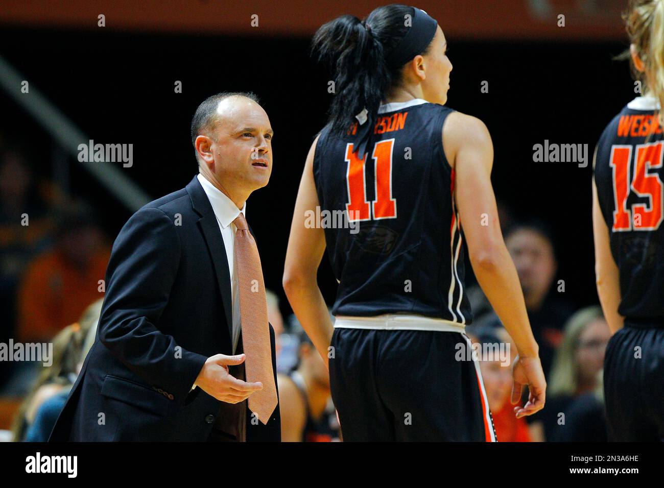 Oregon State head coach Scott Rueck talks to guard Gabriella Hanson (11 ...