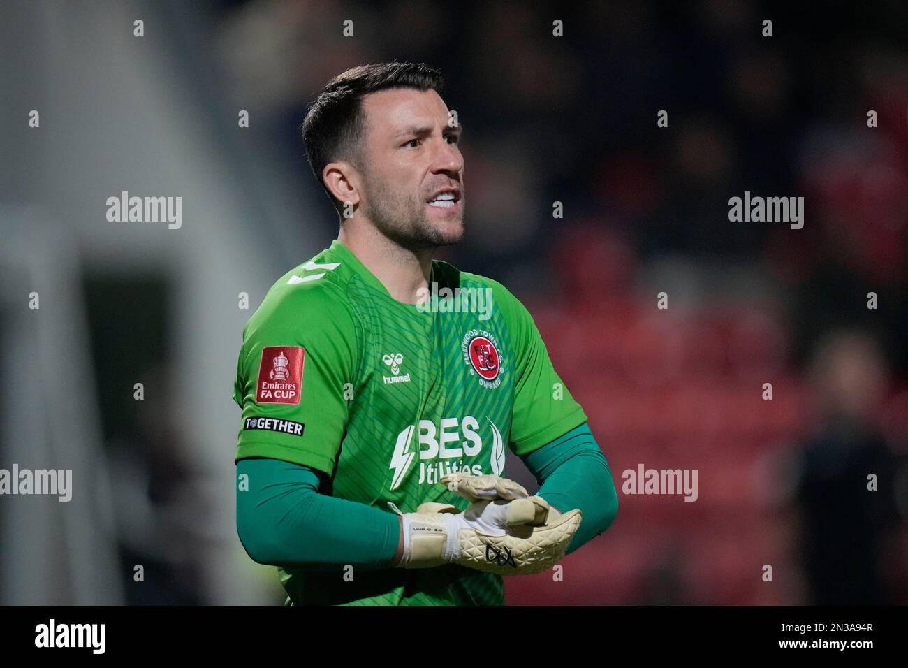 Jay Lynch #13 of Fleetwood Town shouts instructions during the Emirates ...