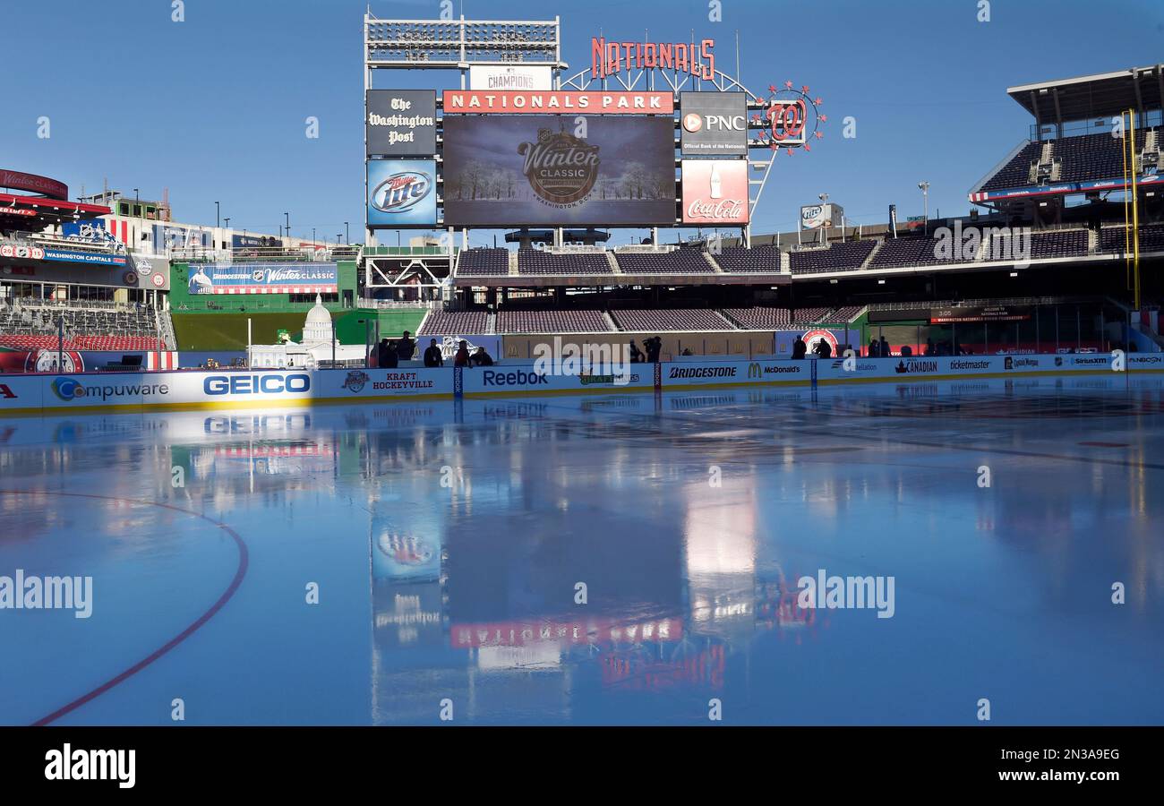 The rink at Nationals Park in Washington stands coated with ice Tuesday ...