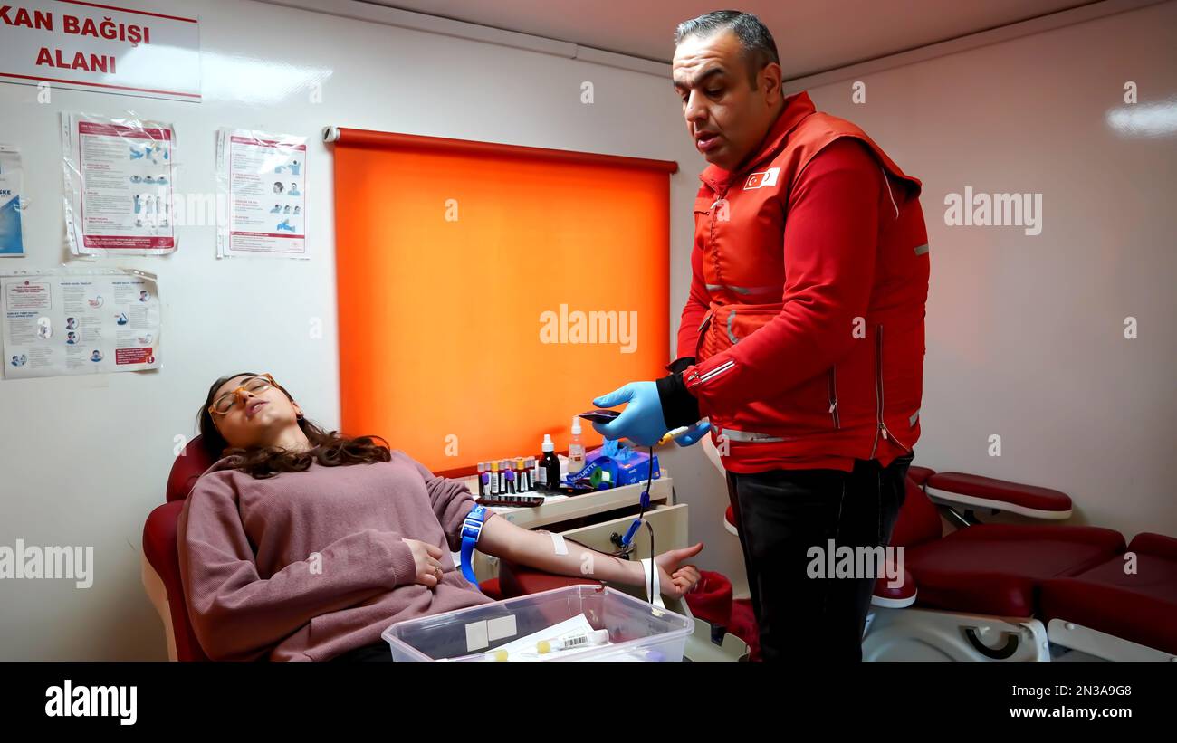 Teenager giving blood hi-res stock photography and images - Alamy