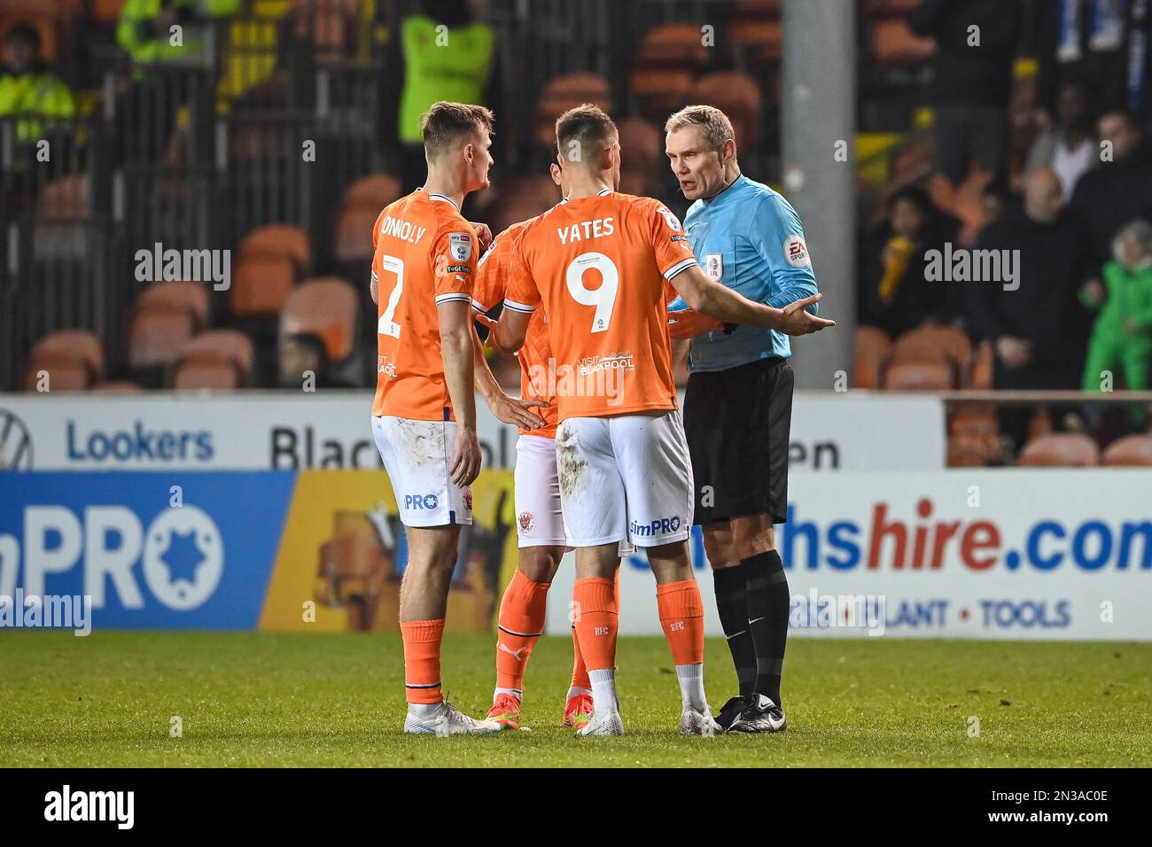 Jerry Yates #9 of Blackpool speaks to Referee Graham Scott during the ...