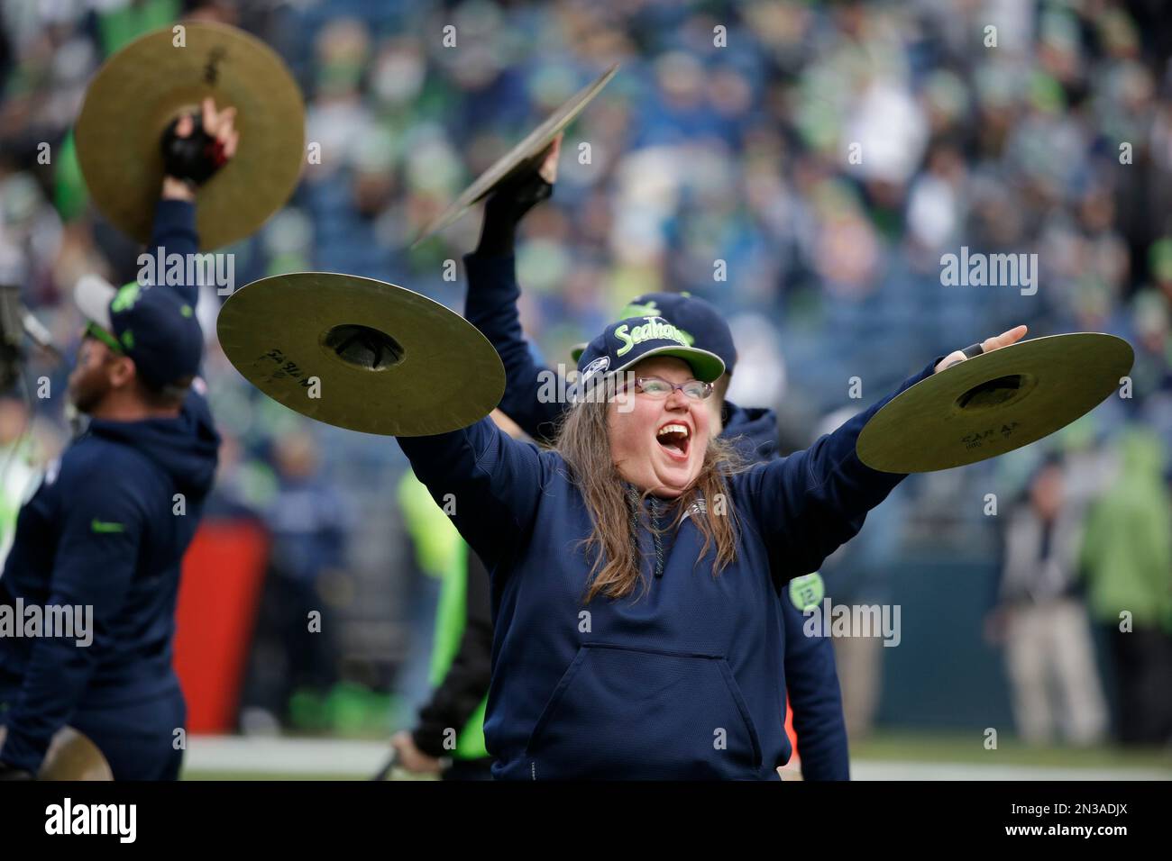 Members of the Seattle Seahawks Blue Thunder drumline perform before an ...