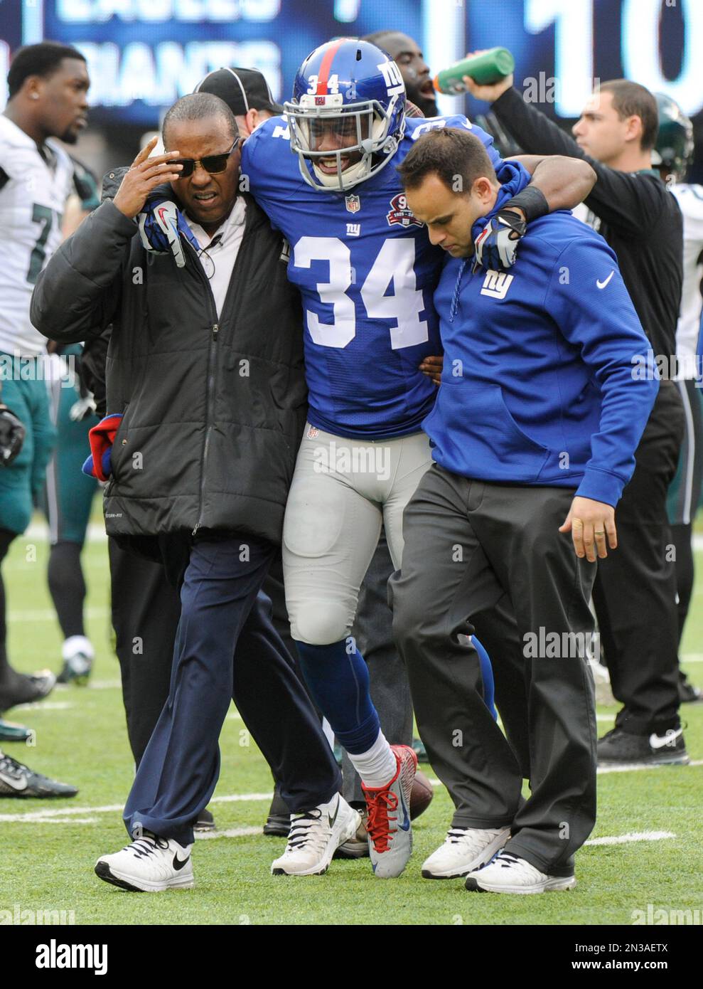 New York Giants safety Nat Berhe (34) is helped off the field after ...