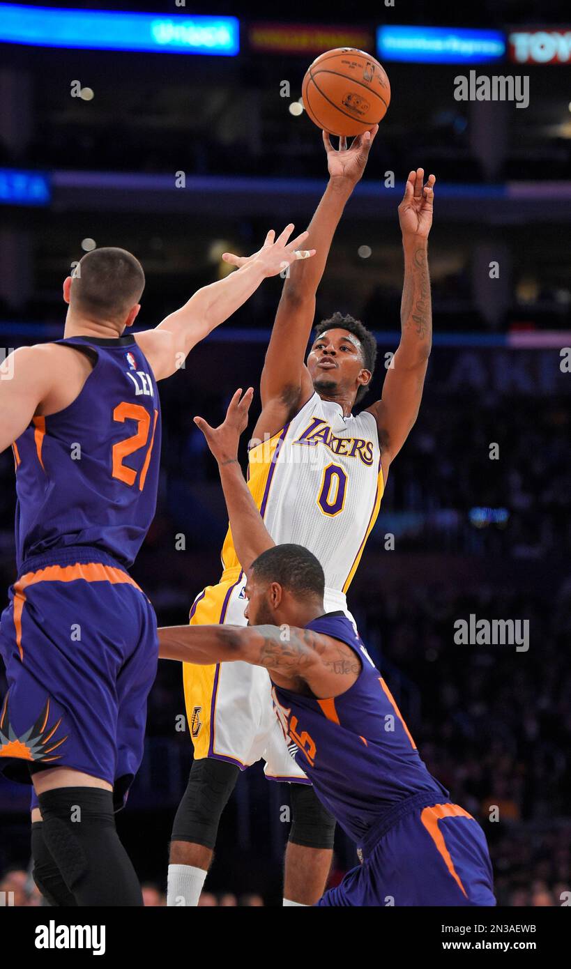 Los Angeles Lakers forward Nick Young shoots as Phoenix Suns center ...
