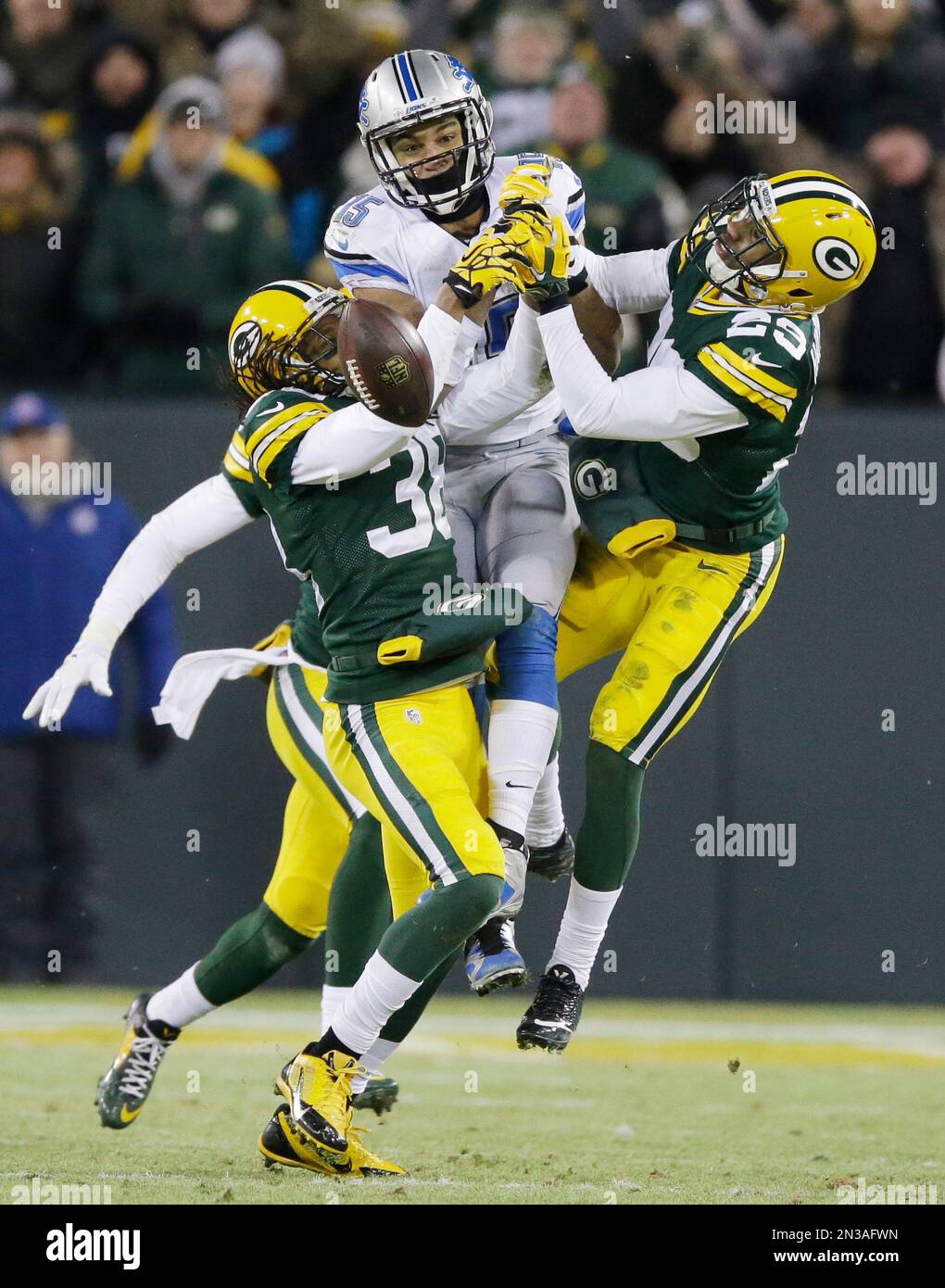Green Bay Packers' Tramon Williams (38) and Casey Hayward break up a ...