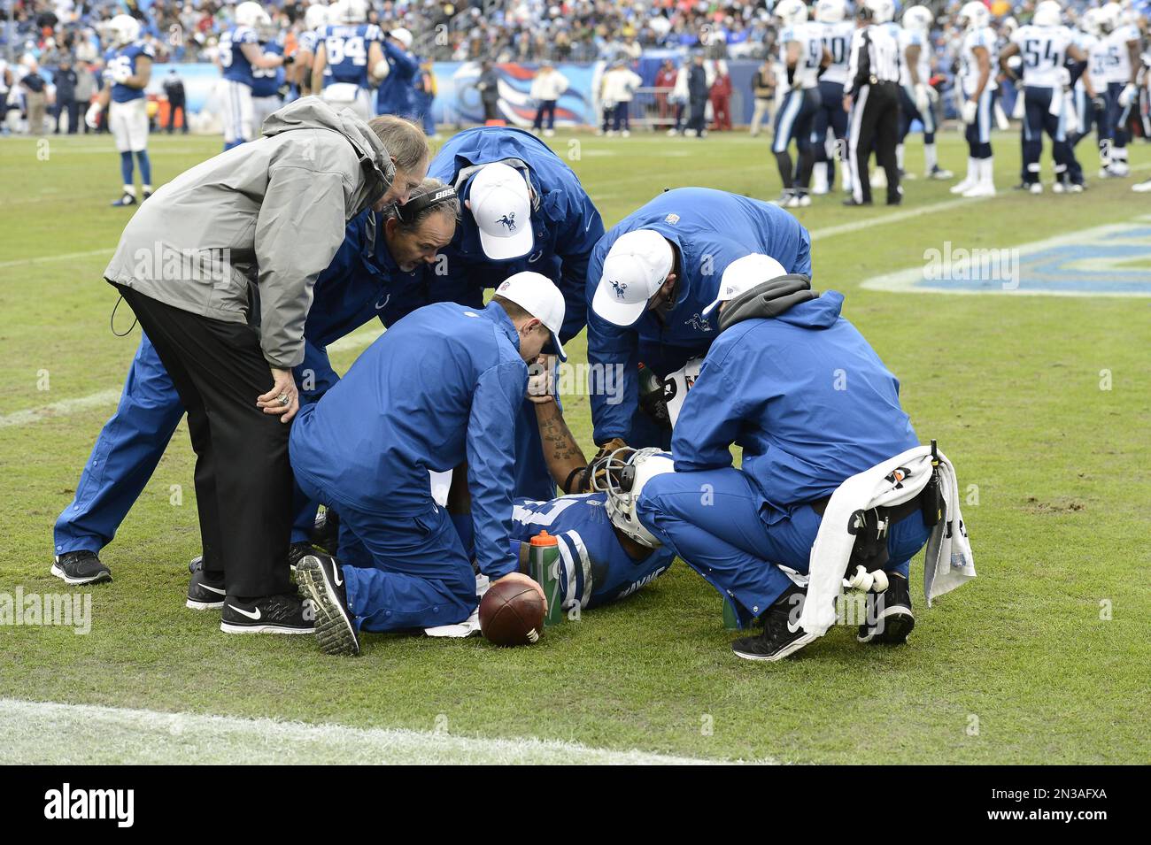 Indianapolis Colts wide receiver Reggie Wayne (87) is helped up after a ...