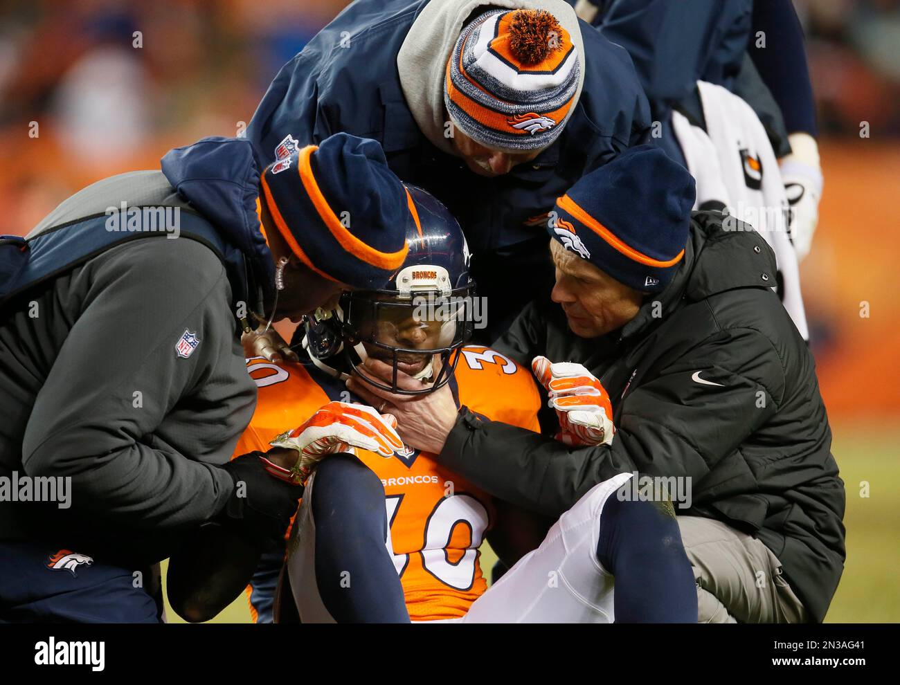 Denver Broncos strong safety David Bruton is attended to by medical ...