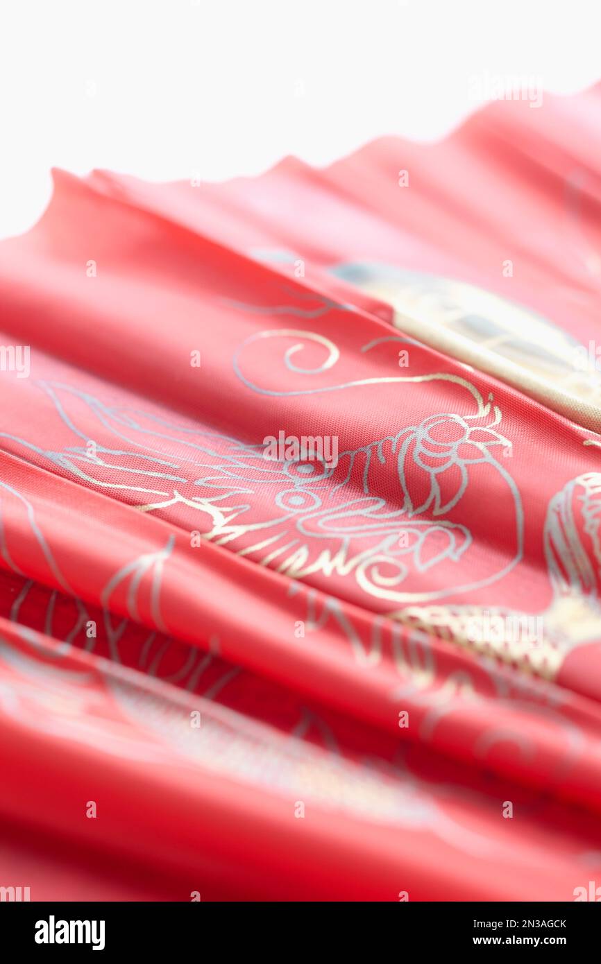 Red Handheld Fan Stock Photo - Alamy