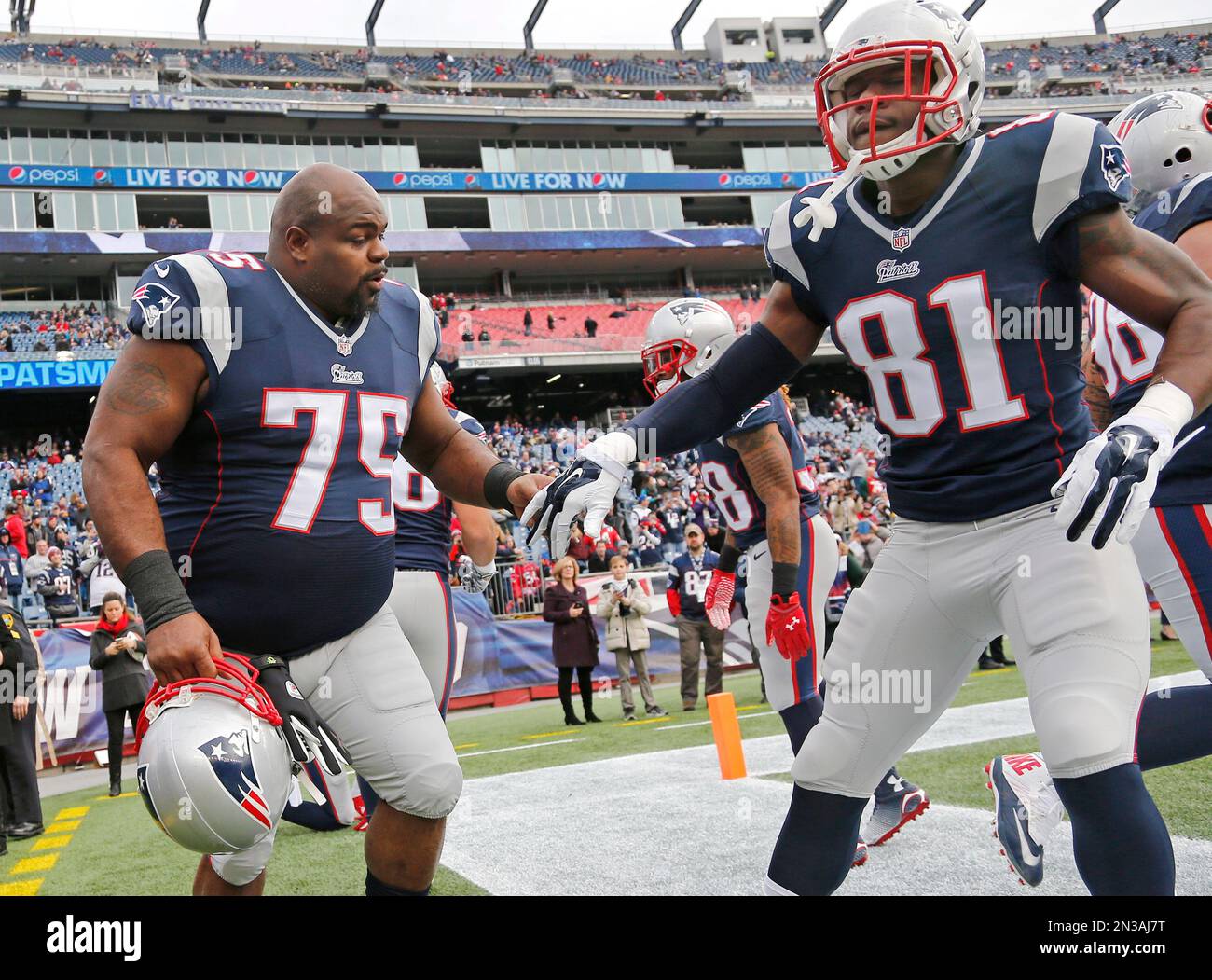 New England Patriots tight end Timothy Wright (81) greets defensive ...