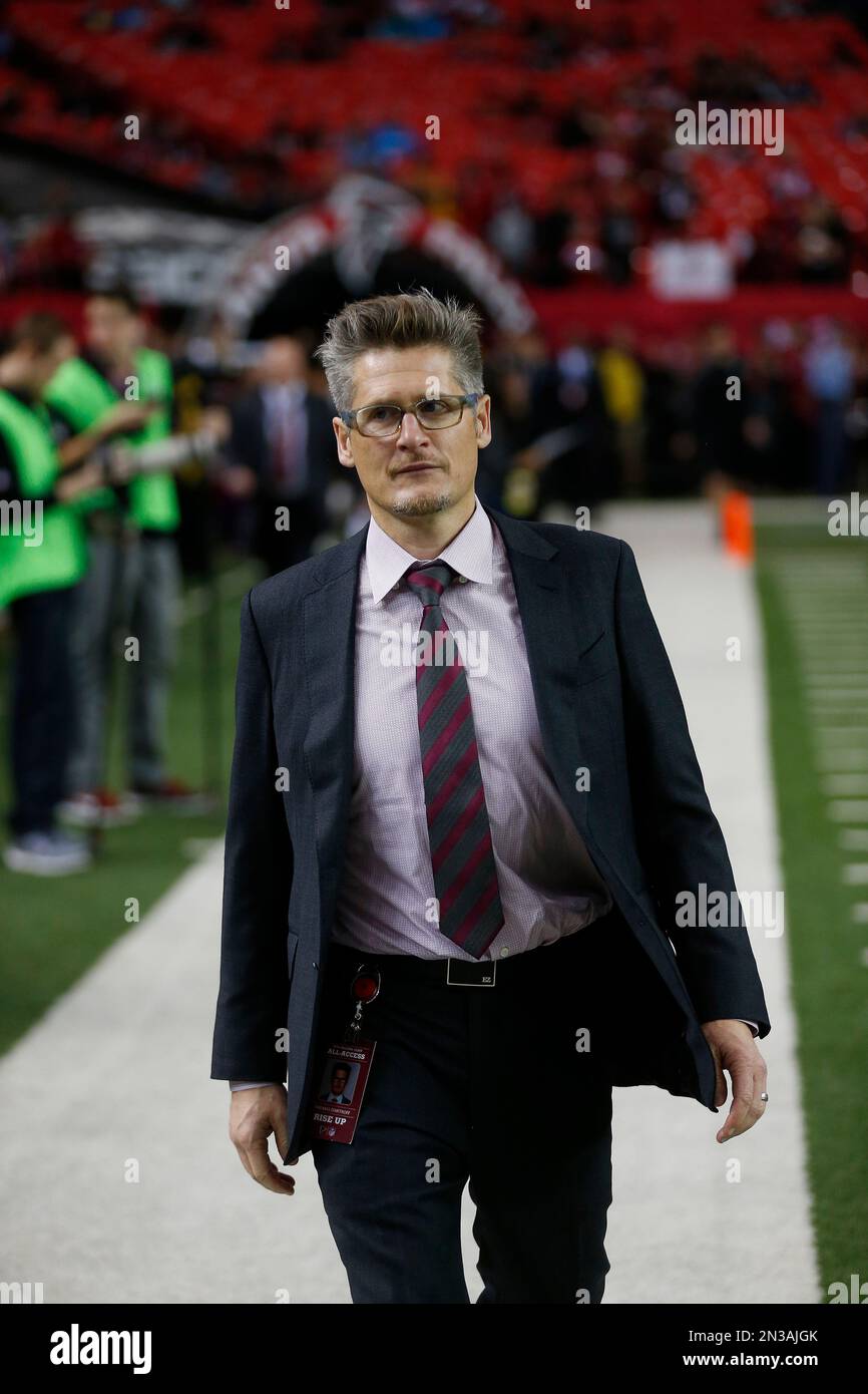 Atlanta Falcons General Manager Thomas Dimitroff walks on the field ...