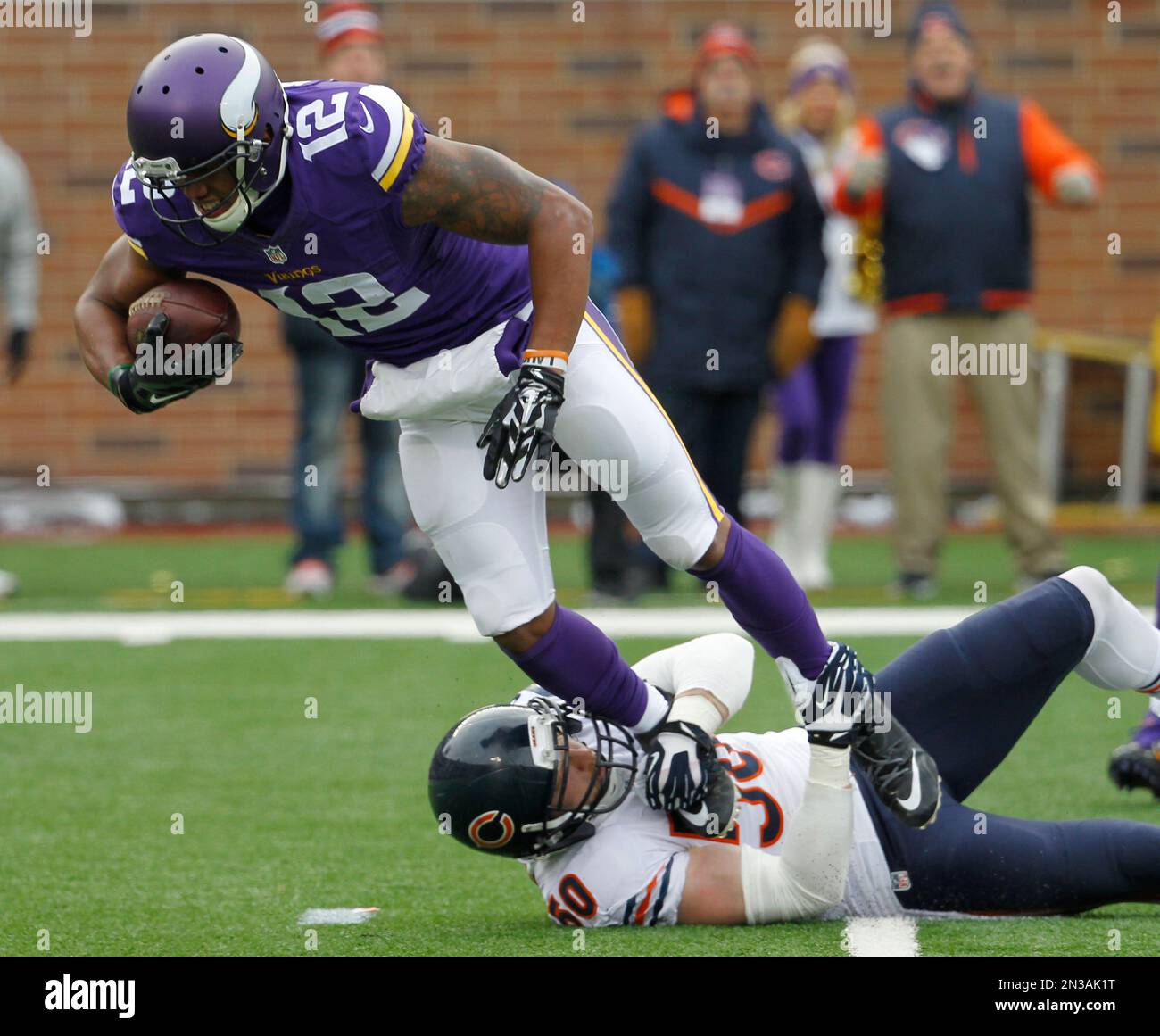 Minnesota Vikings wide receiver Charles Johnson is tackled Chicago ...