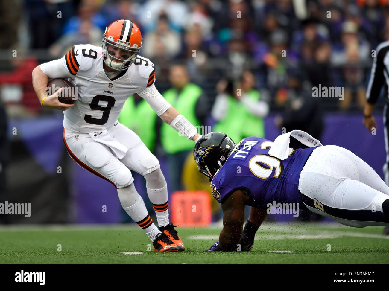 Cleveland Browns quarterback Connor Shaw, left, avoids Baltimore Ravens ...