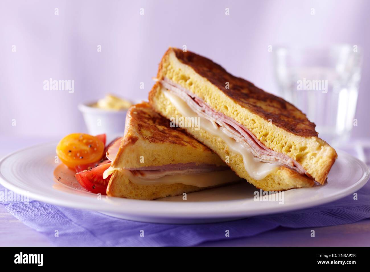 Monte Cristo Sandwich on a purple background Stock Photo - Alamy