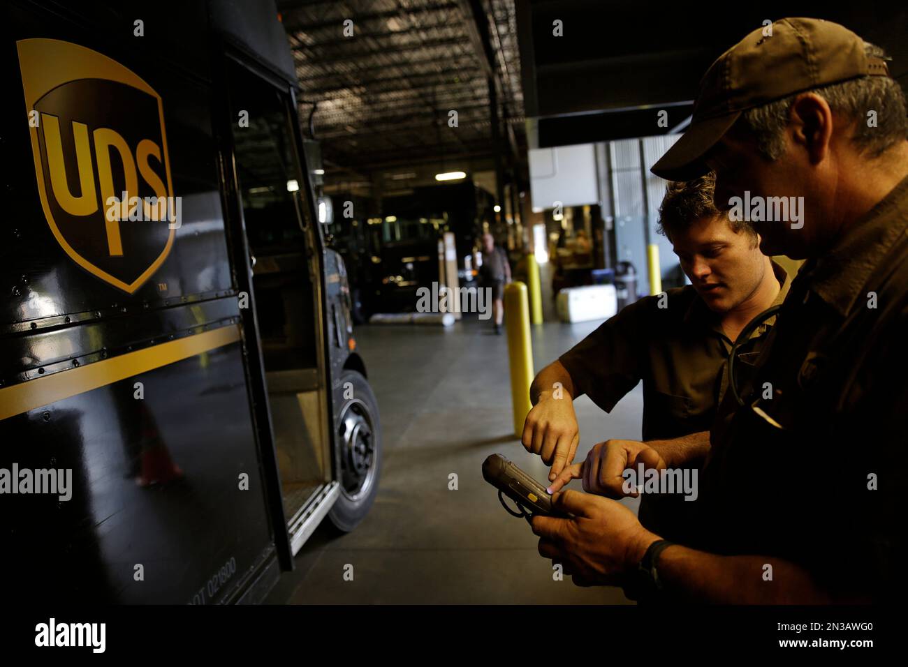 In this June 20, 2014 photo, United Parcel Service driver Richard ...