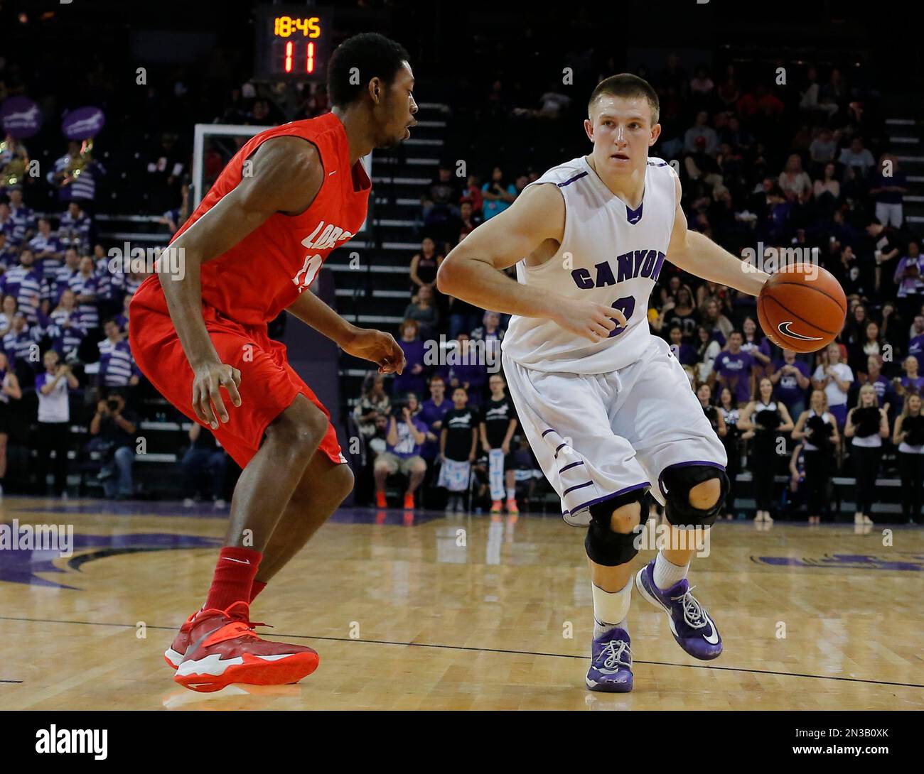 Grand Canyon guard Joshua Braun (2) drives on New Mexico guard Xavier ...