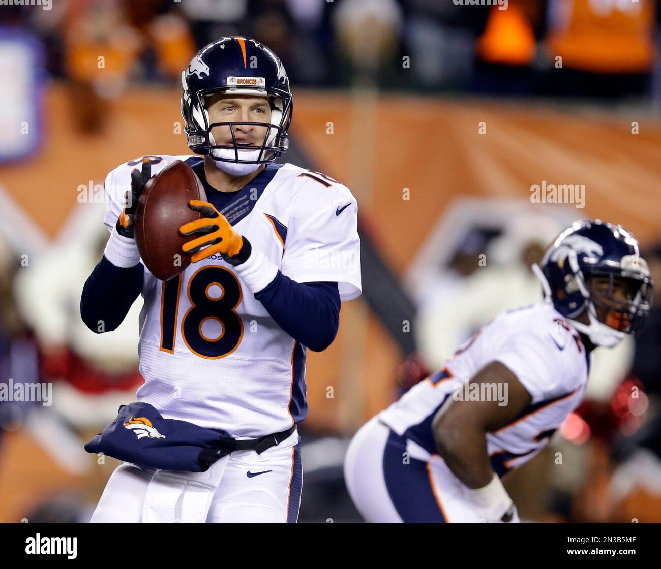 Denver Broncos quarterback Peyton Manning looks to pass against the ...
