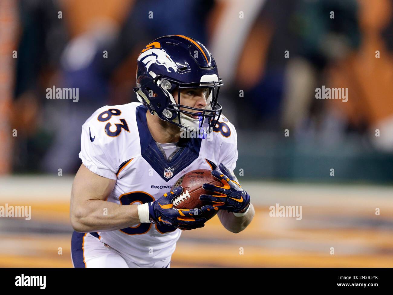 Denver Broncos wide receiver Wes Welker runs with a catch against the ...