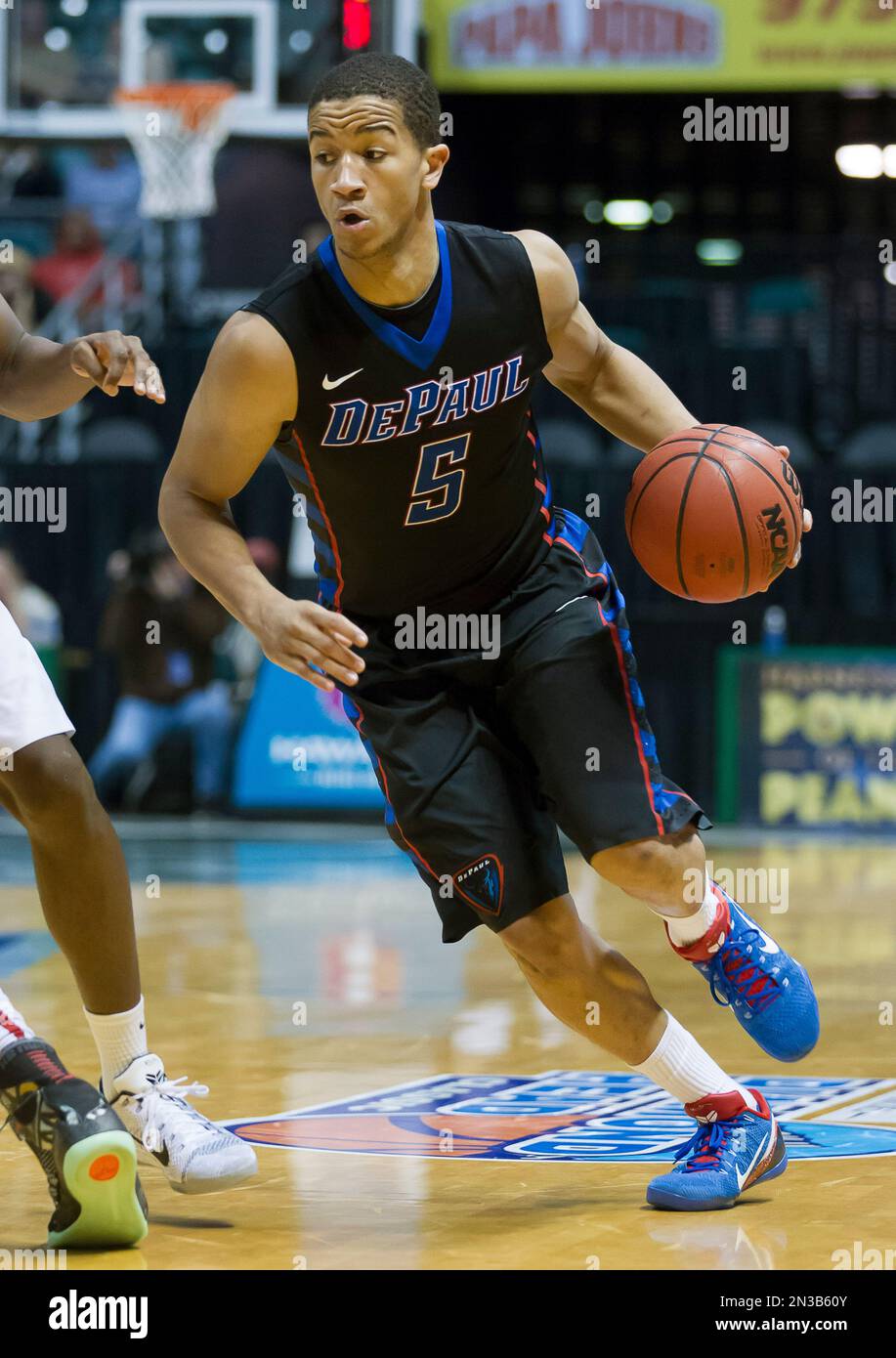 DePaul guard Billy Garrett Jr. (5) dribbles the basketball in the ...