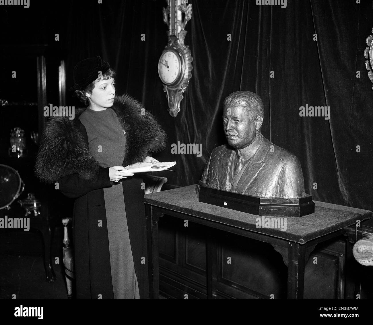 A visitor views a bust of the late Reginald Vanderbilt, husband of ...