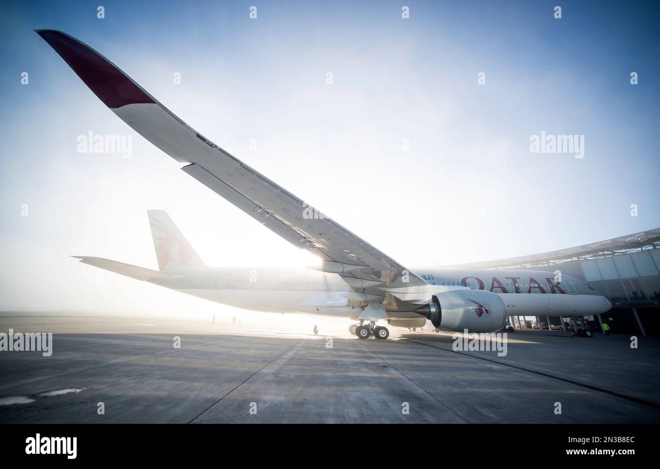 The first Airbus A350 for Qatar Airways sits on the tarmac during the ...