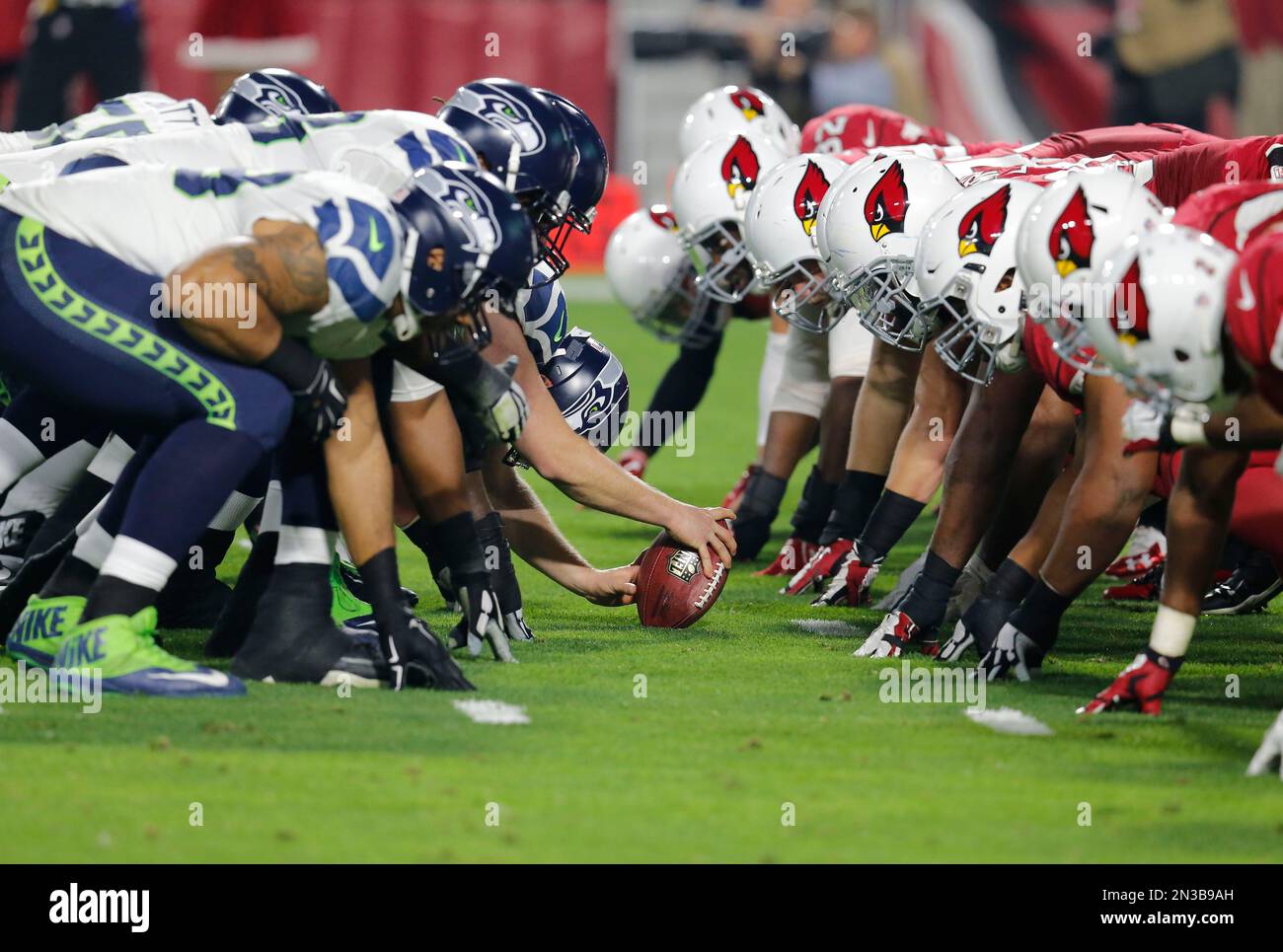 The Arizona Cardinals and the Seattle Seahawks line up during the first ...