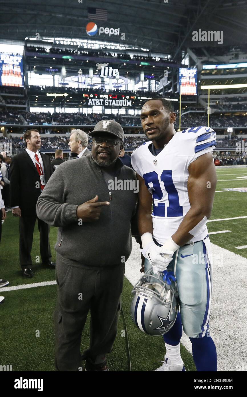 Dallas Cowboys running back Joseph Randle (21) poses with Cedric the ...