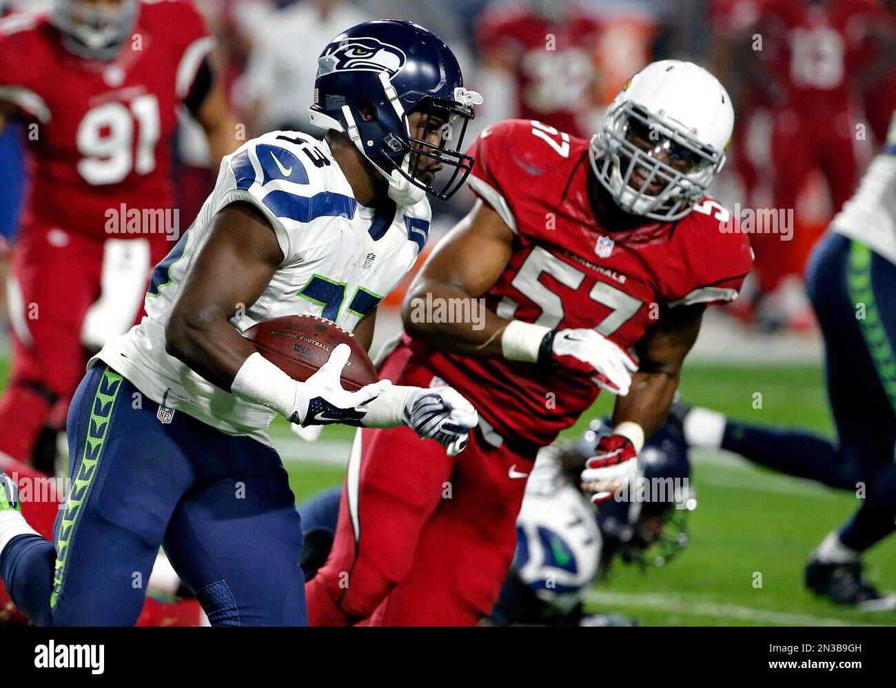 Seattle Seahawks running back Christine Michael (33) runs as Arizona ...