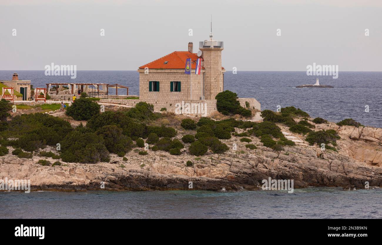OTOCIC HOST, VIS, CROATIA, EUROPE - Lighthouse building on Host island ...