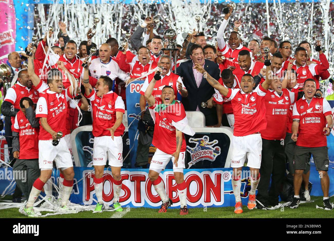 Team Santa Fe celebrates their championship victory at the end of the ...