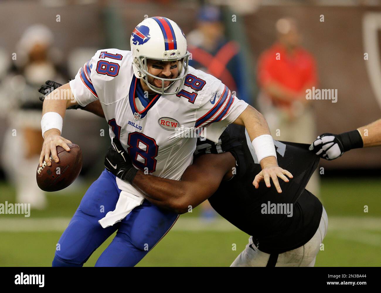 Buffalo Bills quarterback Kyle Orton (18) is sacked by Oakland Raiders ...