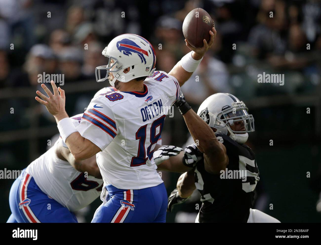 Buffalo Bills quarterback Kyle Orton (18) passes as Oakland Raiders ...