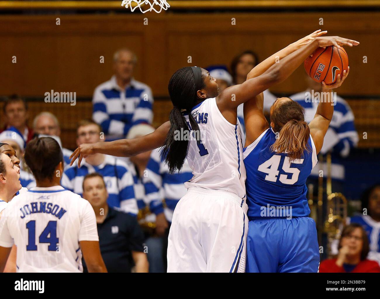 Duke's Elizabeth Williams (1) blocks a shot by Kentucky's Alyssa Rice ...