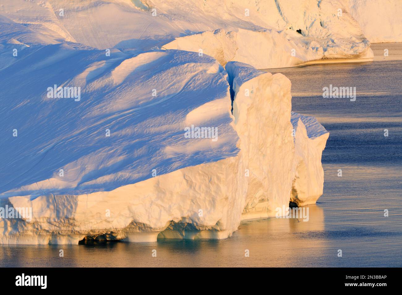 Icebergs at Ilulissat icefjord at sunrise, Ilulissat, Icefjord, Disko ...