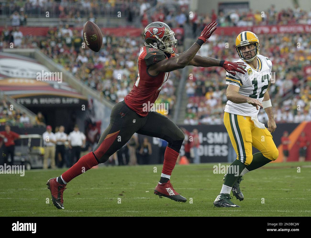 Green Bay Packers quarterback Aaron Rodgers (12) flips the ball past ...