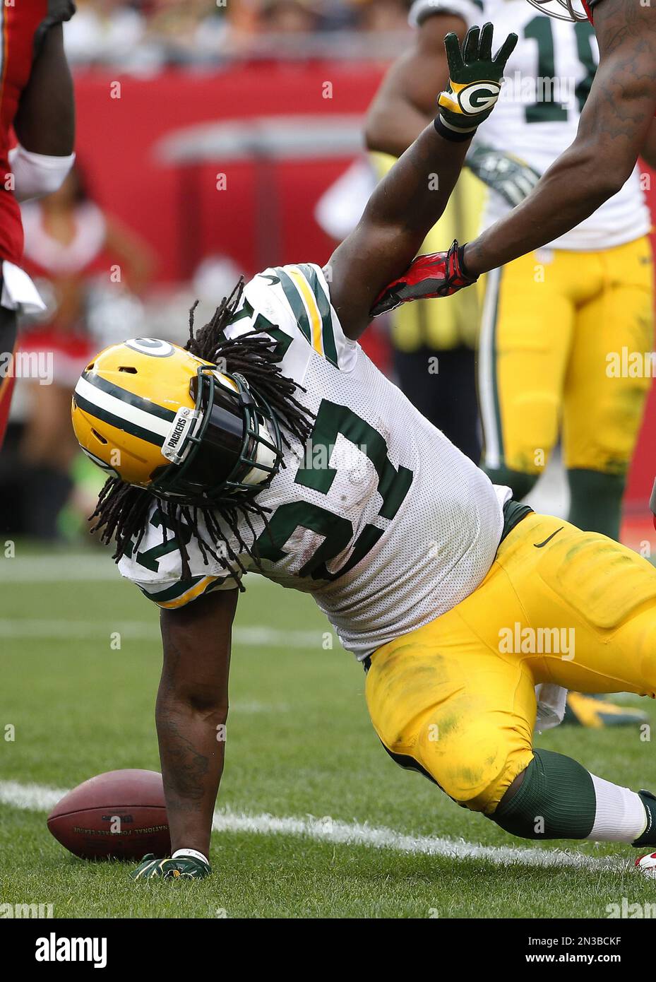 Green Bay Packers running back Eddie Lacy (27) reacts after being ...