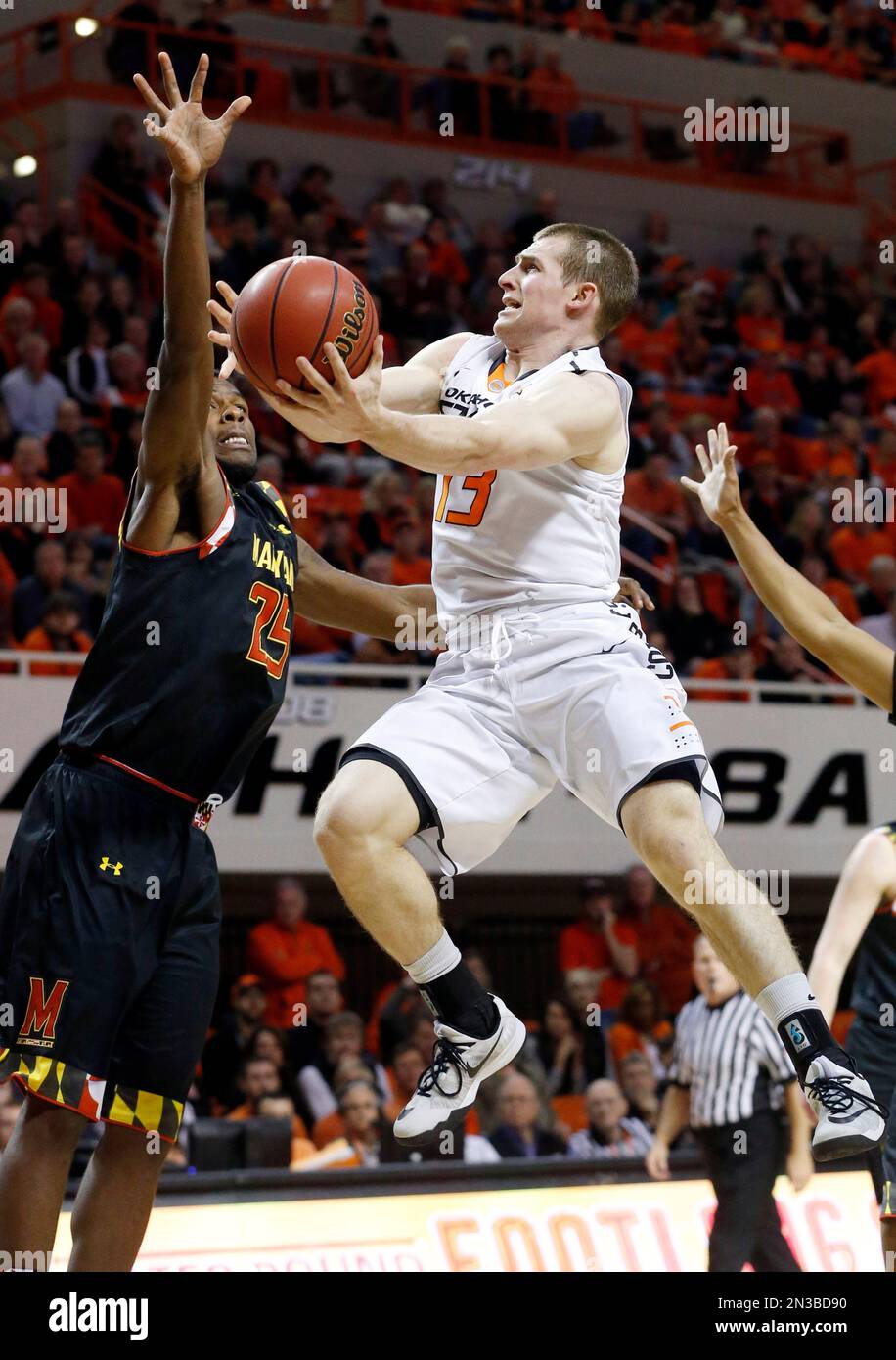 Oklahoma State guard Phil Forte (13) shoots as Maryland forward ...