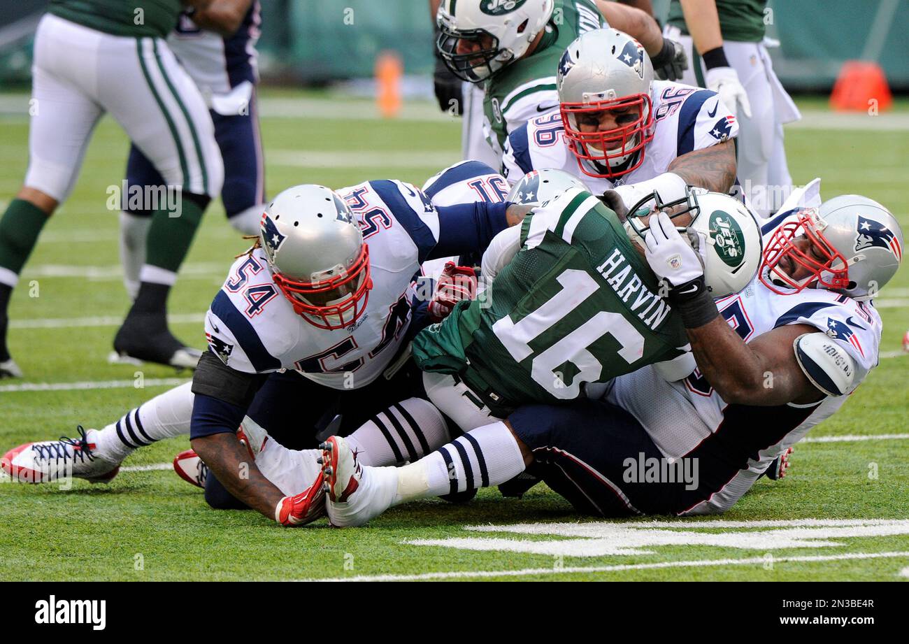 New England Patriots' Vince Wilfork (75) and teammates Dont'a Hightower ...