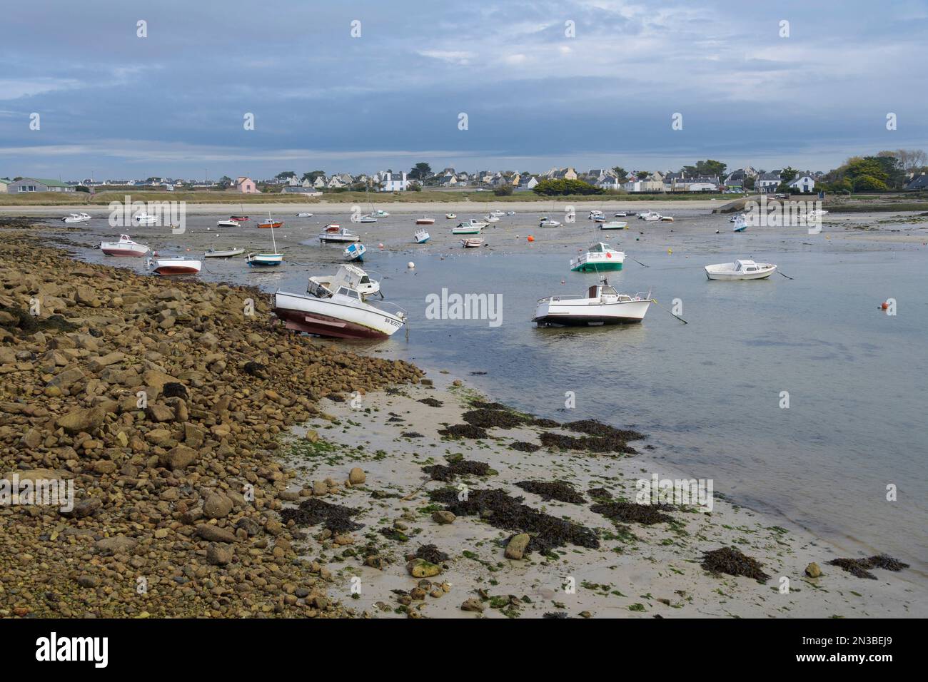 Harbor with boats at low tide, Plage de Porssevigne, Plouarzel ...