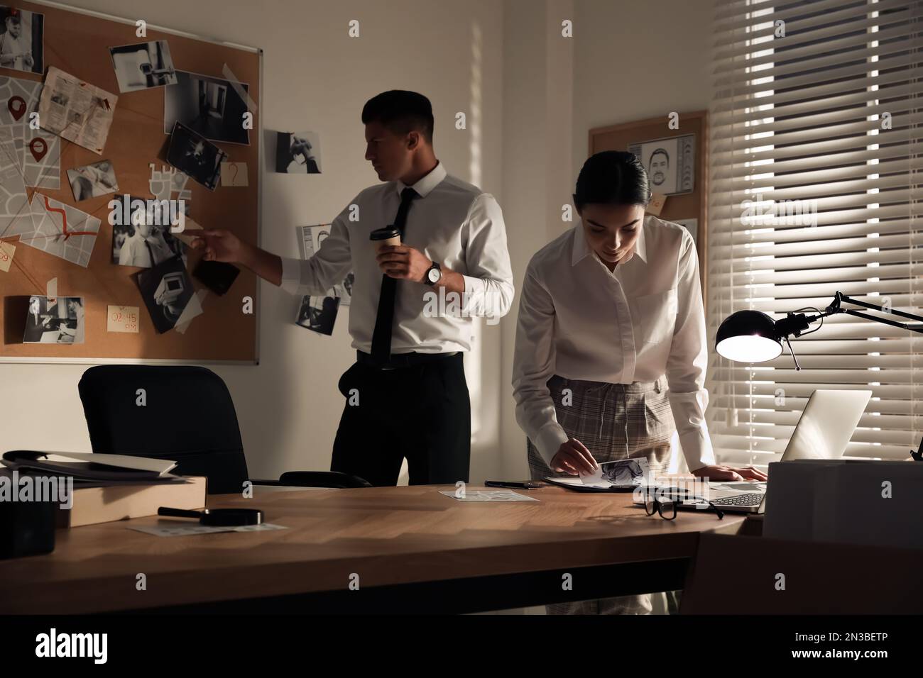 Professional detectives working on hi-res stock photography and images ...
