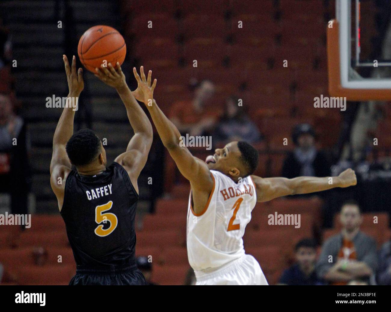 Long Beach State guard Mike Caffey (5) shoot against Texas guard ...