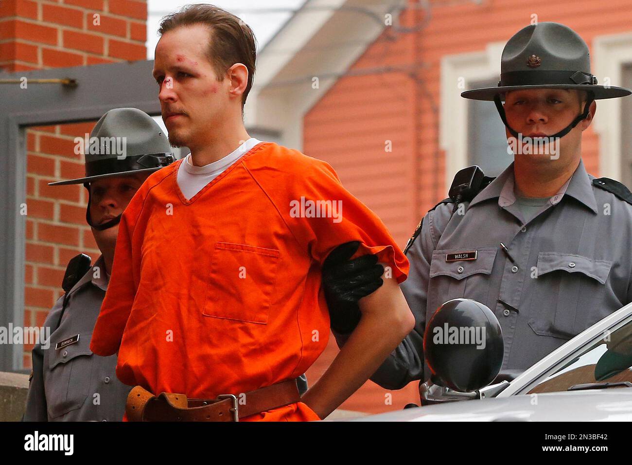 FILE - In this Oct. 31, 2014 file photo Eric Frein is escorted by ...