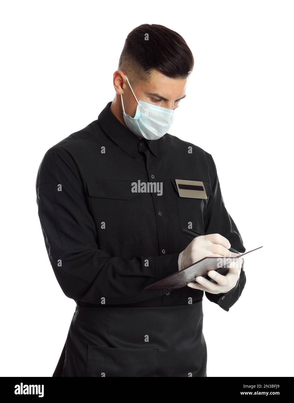 Waiter in medical face mask taking order on white background Stock ...