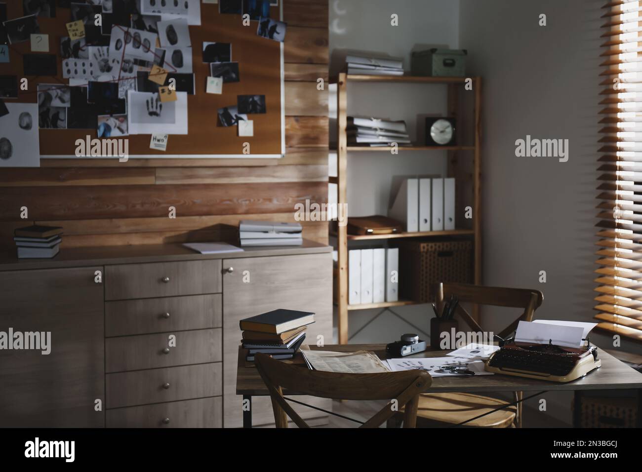 Detective office interior with evidence board on wall Stock Photo - Alamy