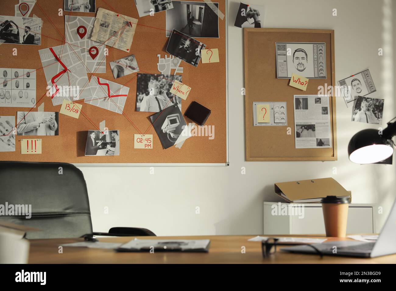 Detective office interior with big wooden desk and evidence board Stock ...