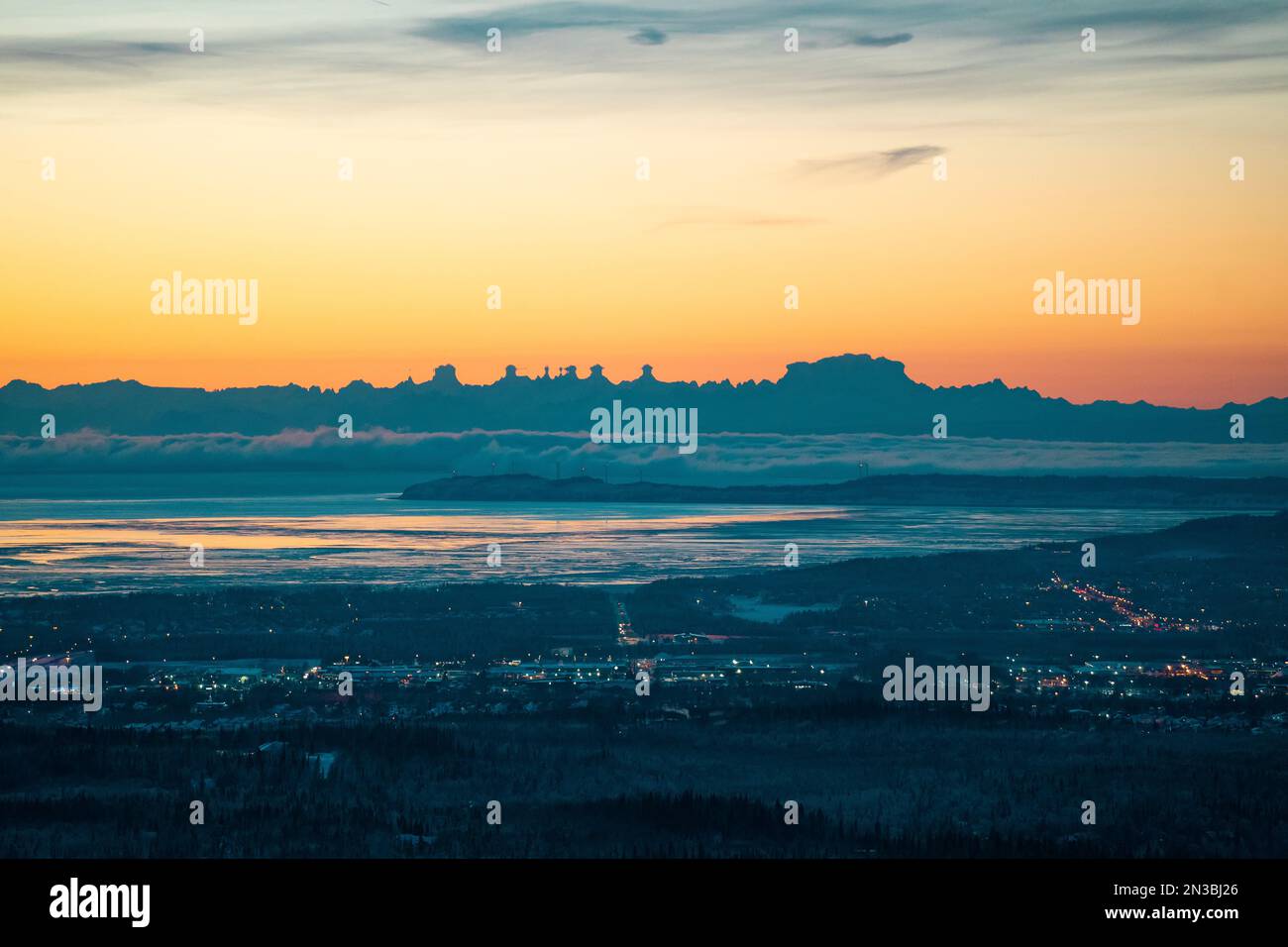 The winter inversion, or fata morgana, accentuates the peaks as the sun ...